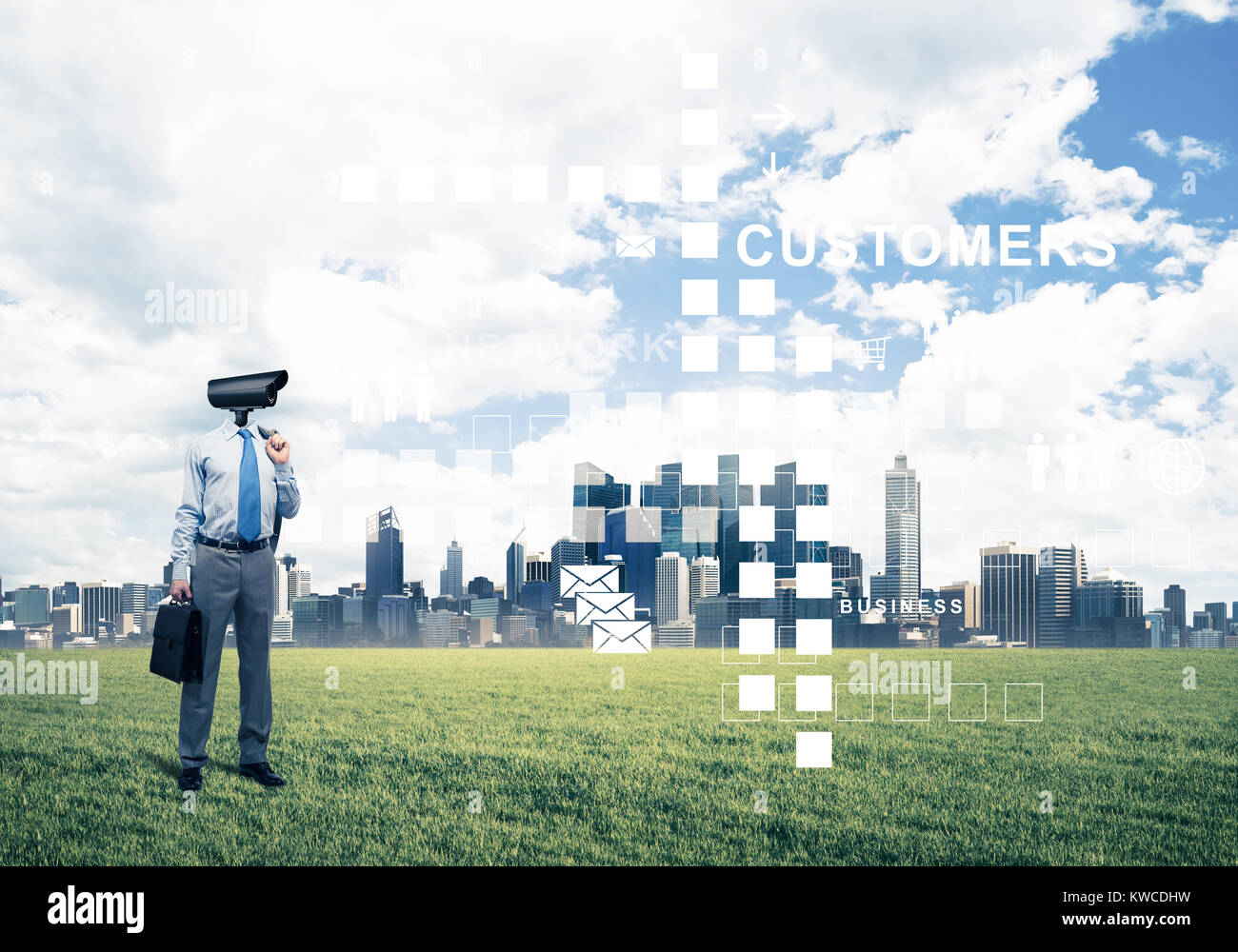 Camera headed man standing on green grass against modern citysca Stock ...