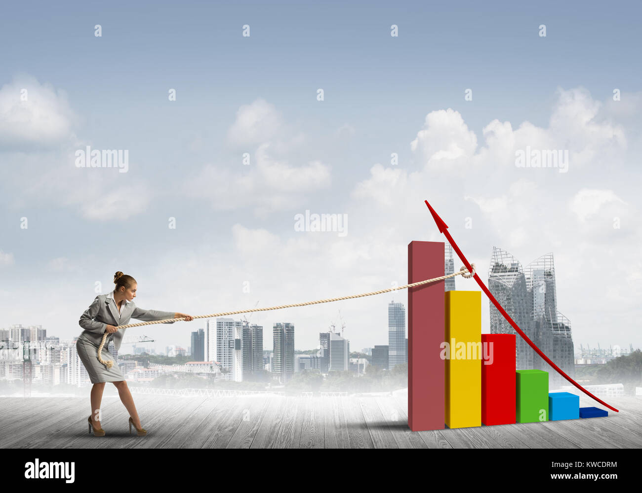 Businesswoman pulling graph with rope as concept of power and control ...