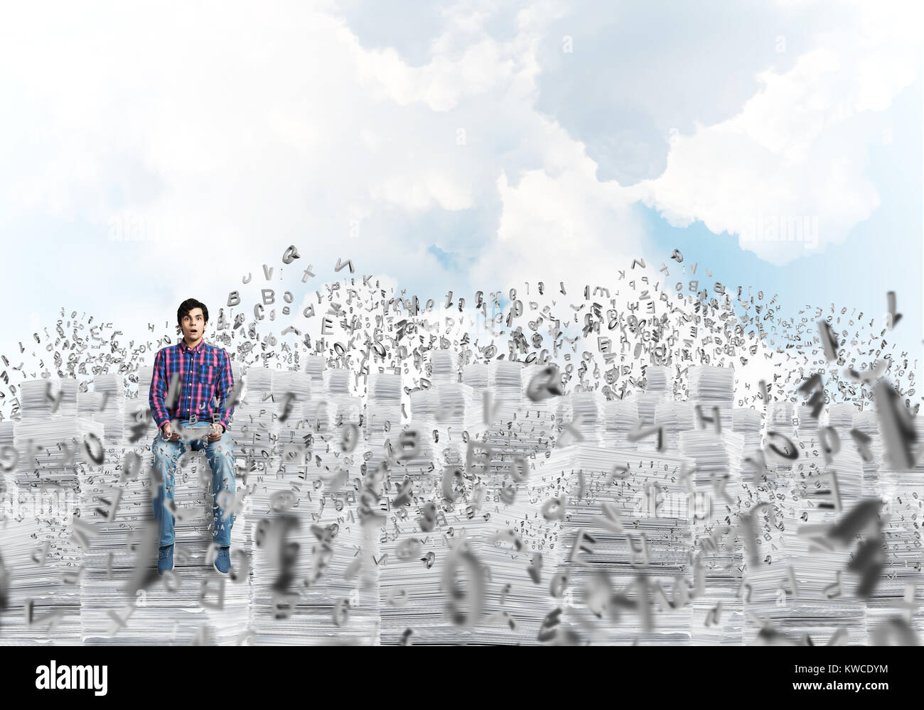 Attractive man sitting on pile of paper documents Stock Photo - Alamy