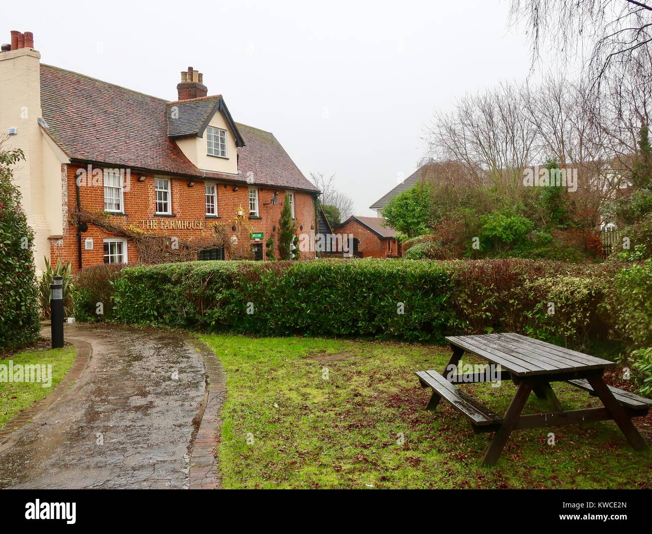 The Hungry Horse Farmhouse pub on a wet, rainy, overcast day. Grange ...