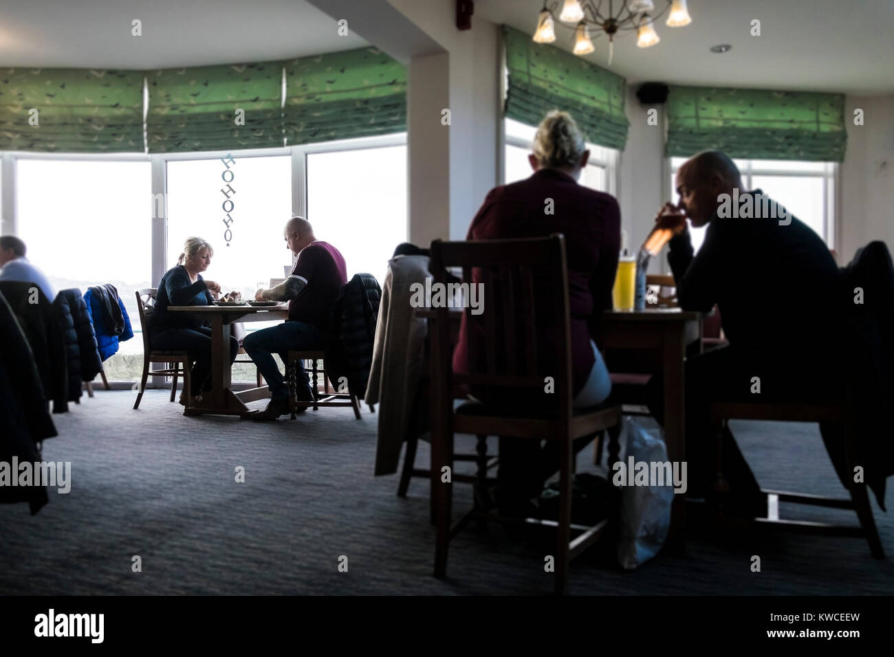 Customers sitting in a bar hi-res stock photography and images - Alamy