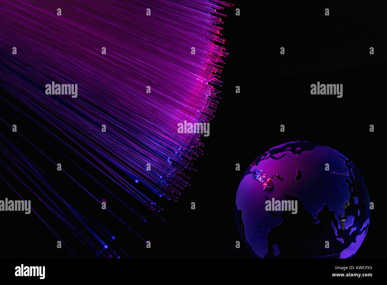 color fiber optical background on black, Fiber optics lights with globe ...
