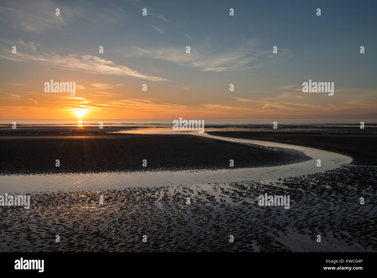 Blackpool sunset & reflection on beach Stock Photo - Alamy