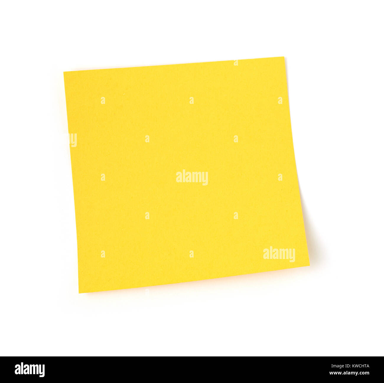 Yellow post it paper note on a white background Stock Photo - Alamy