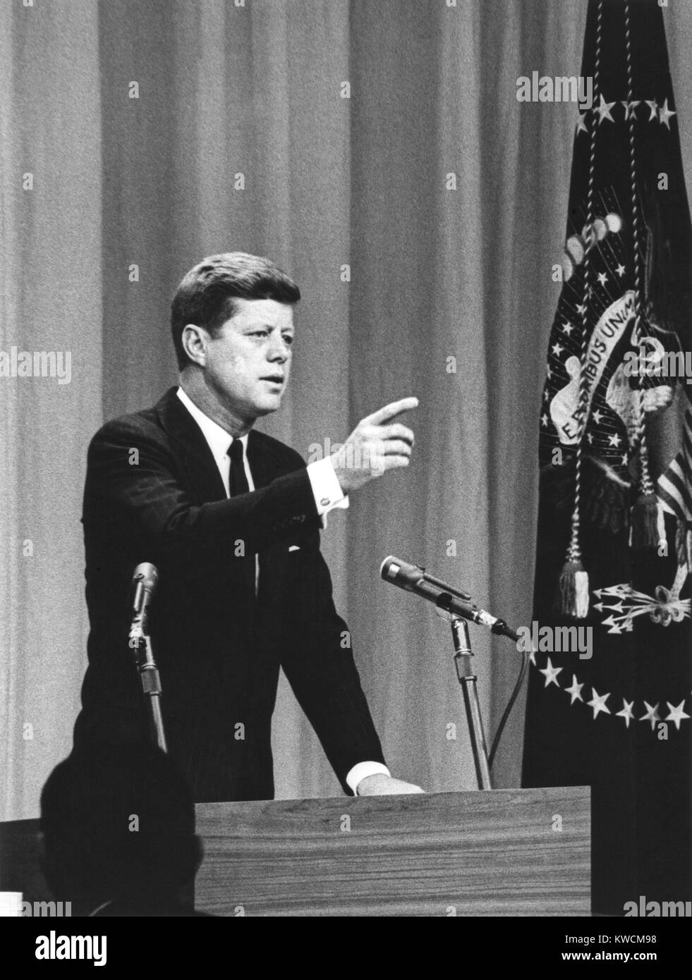 President John Kennedy calls for a question during the first press ...