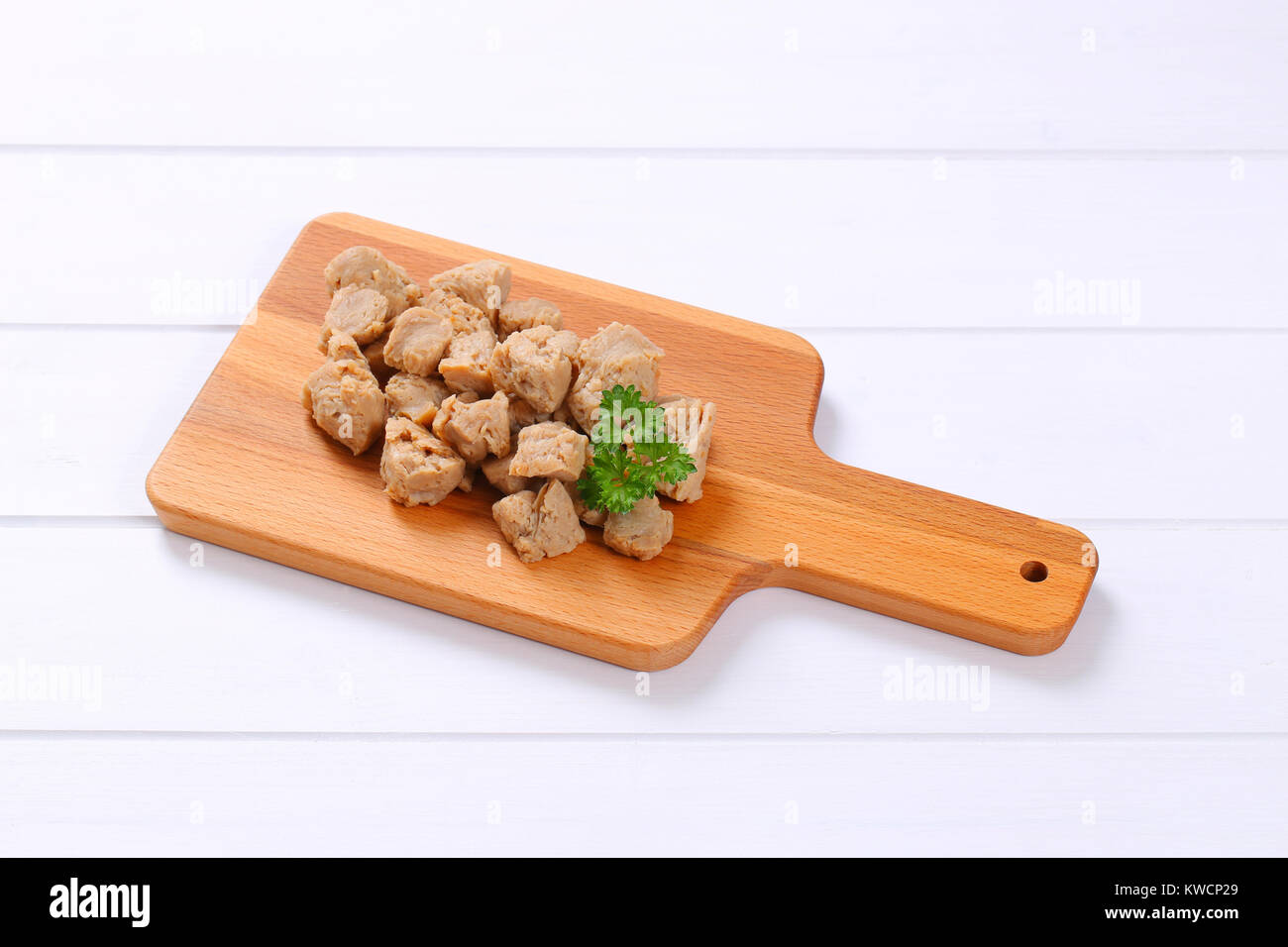 pile of soy meat cubes on wooden cutting board Stock Photo - Alamy