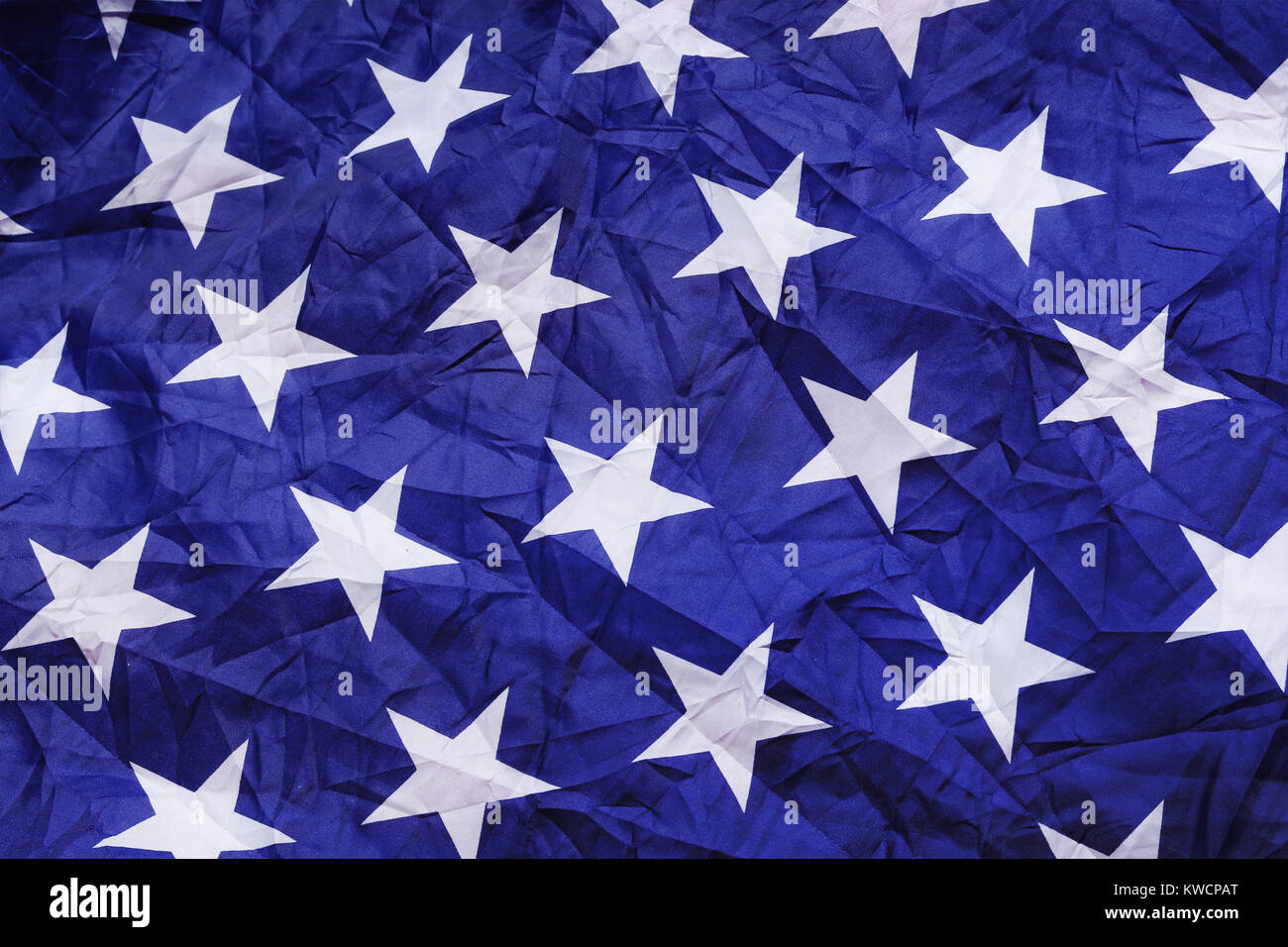 White star on screwed blue silk texture. part of USA flag Stock Photo ...