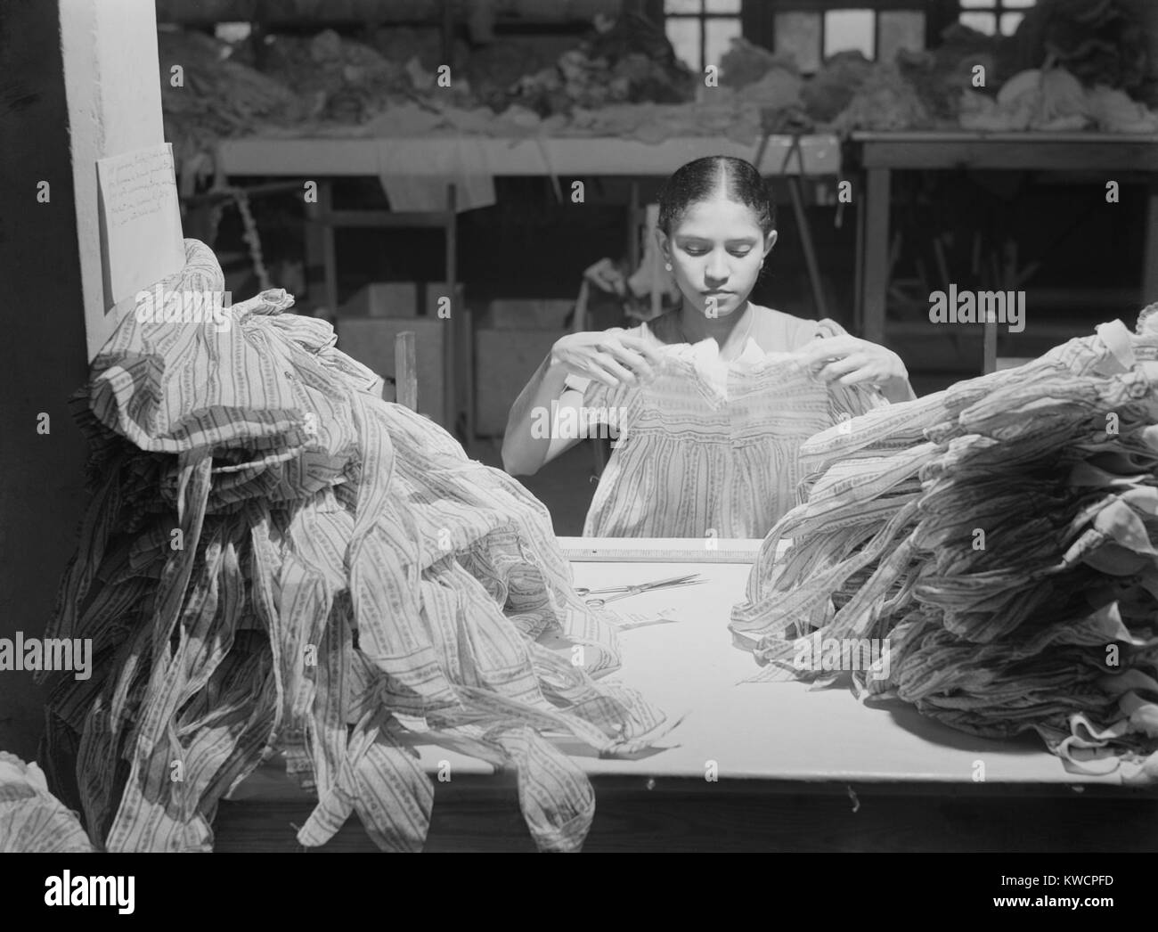 Young Puerto Rican women working in a clothing factory. San Juan ...