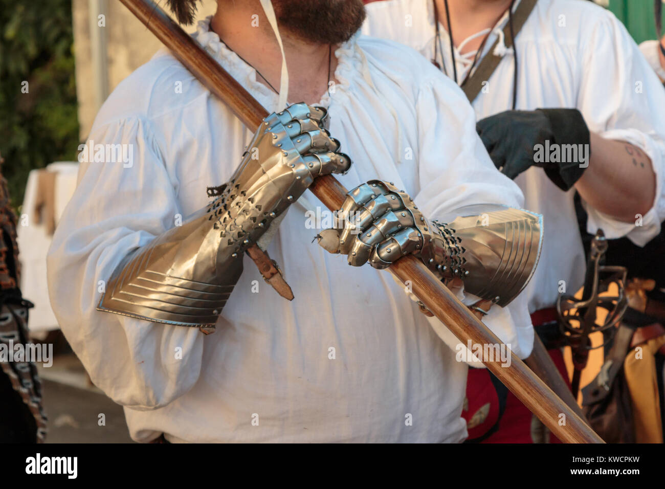 Warrior with Medieval Metallic Mitten for Hands Protection and Wooden ...