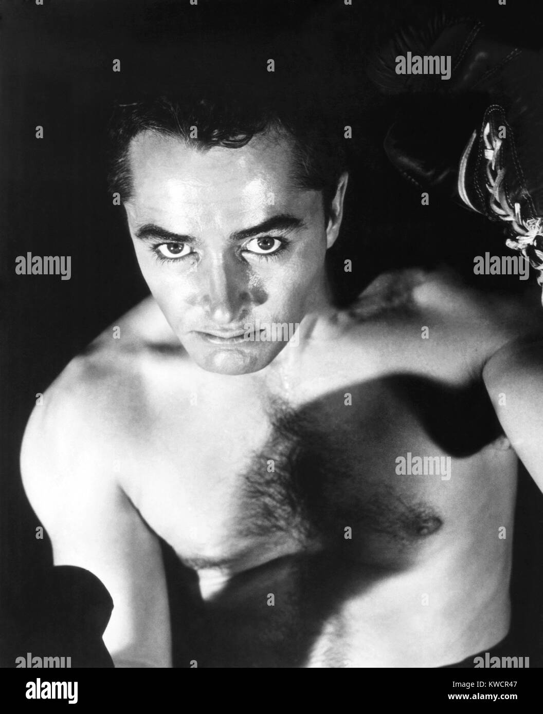 THE LEATHER SAINT, John Derek, 1956 Stock Photo - Alamy