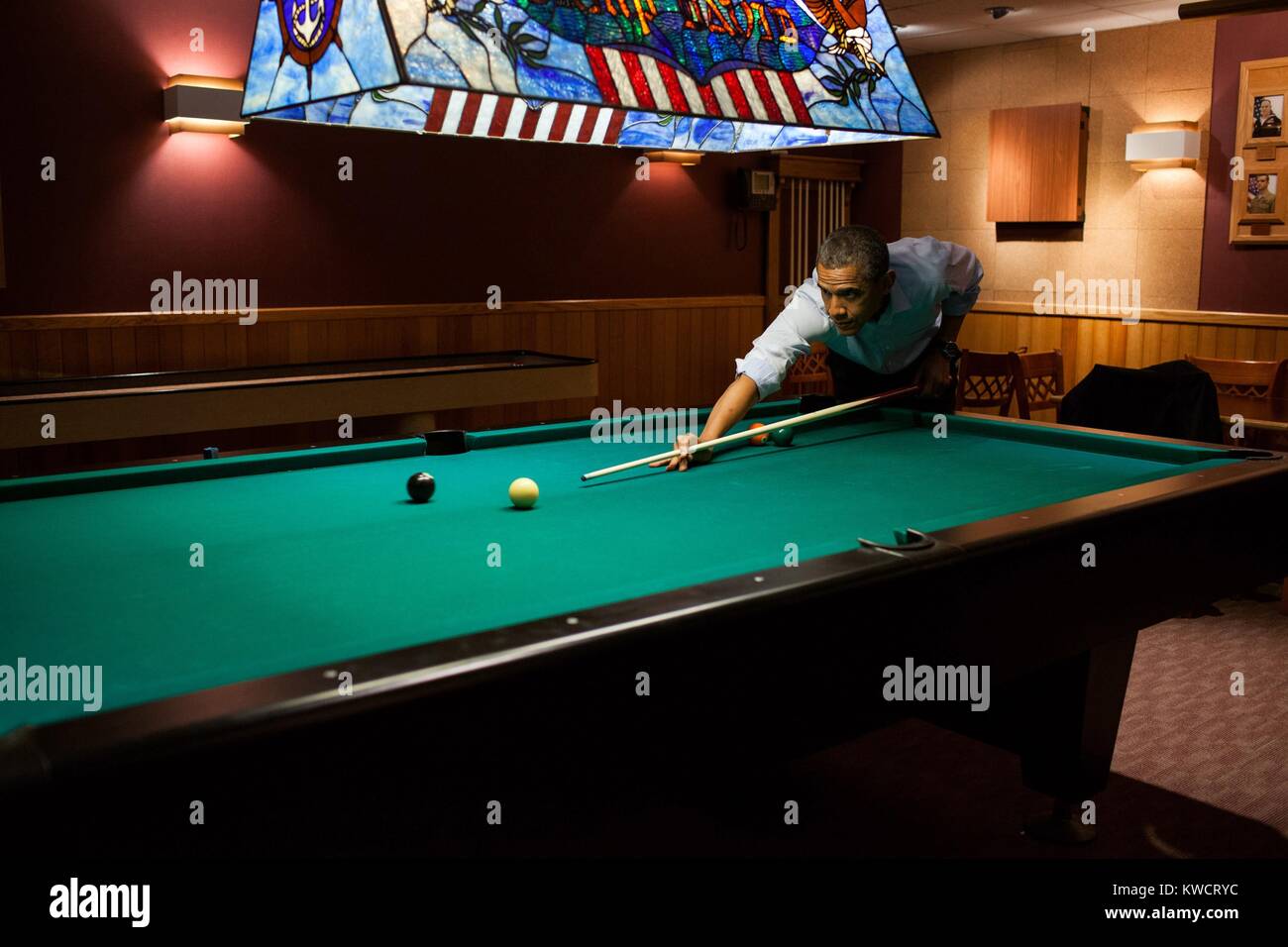 President Barack Obama plays pool after the G8 Summit at Camp David, Md ...