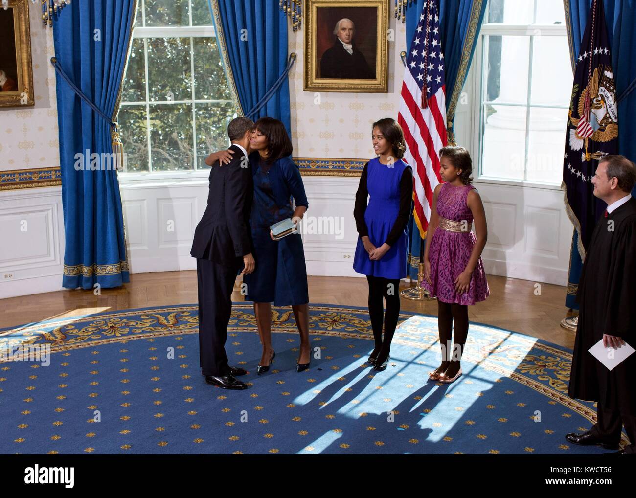 President Barack Obama and Michelle Obama embrace after the official ...