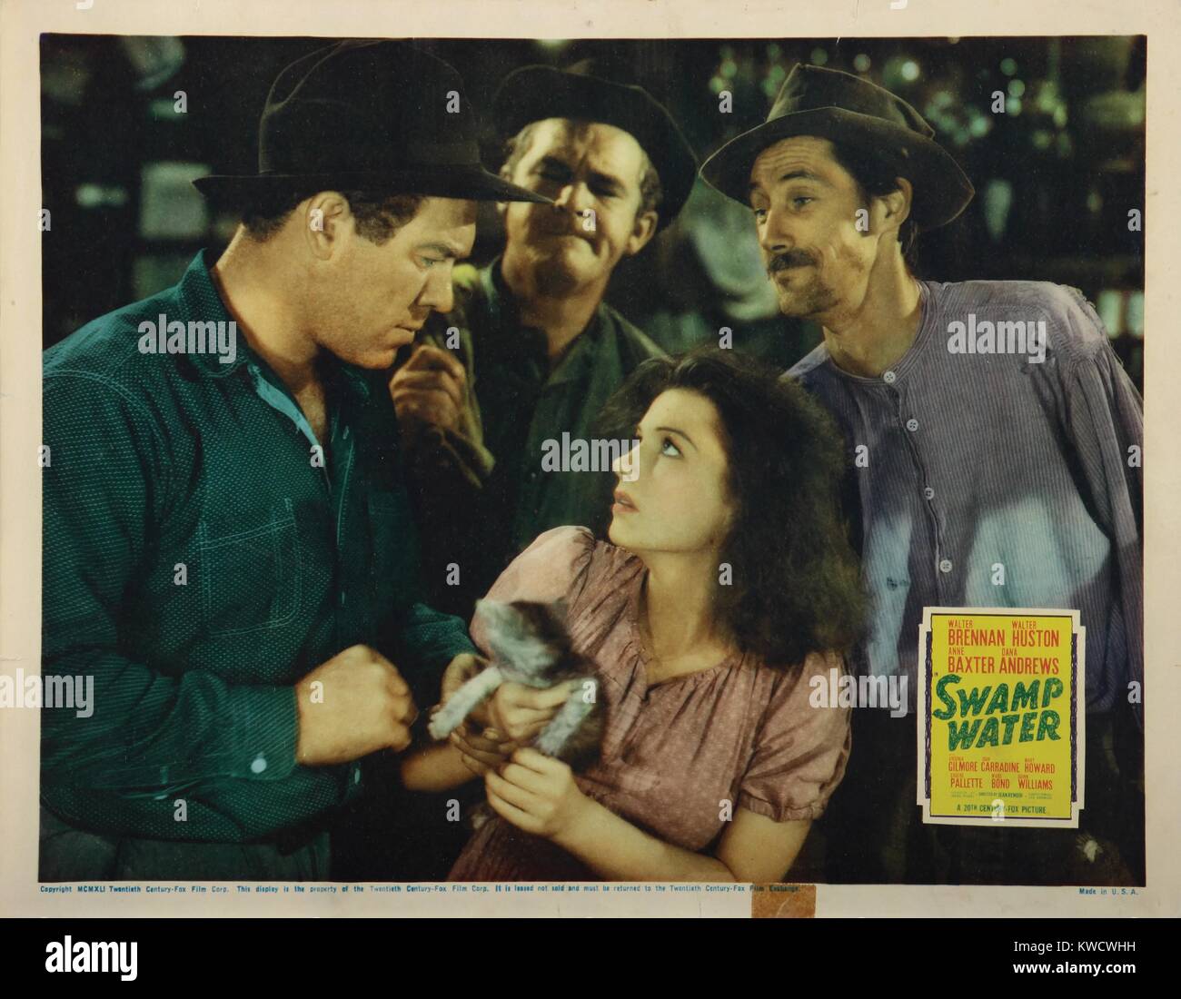 SWAMP WATER, from left: Ward Bond, Anne Baxter, John Carradine, 1941 ...