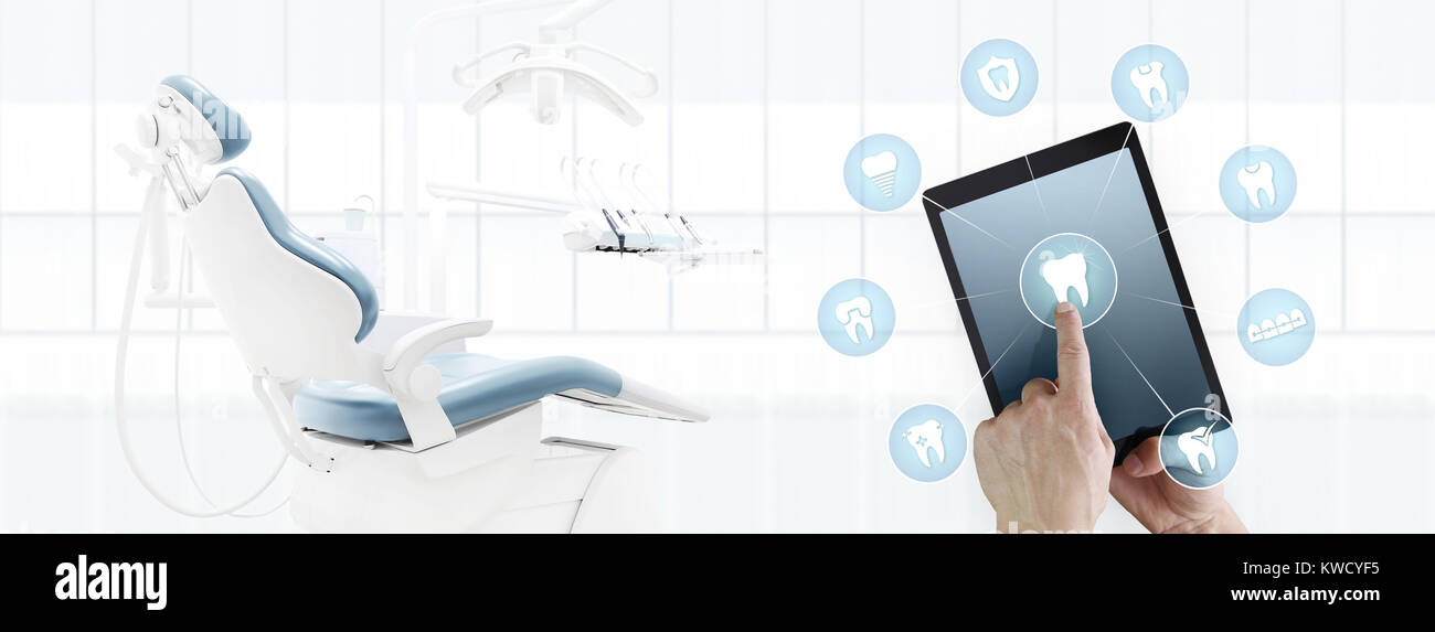 dentist hand touch digital tablet screen teeth icons and symbols on ...