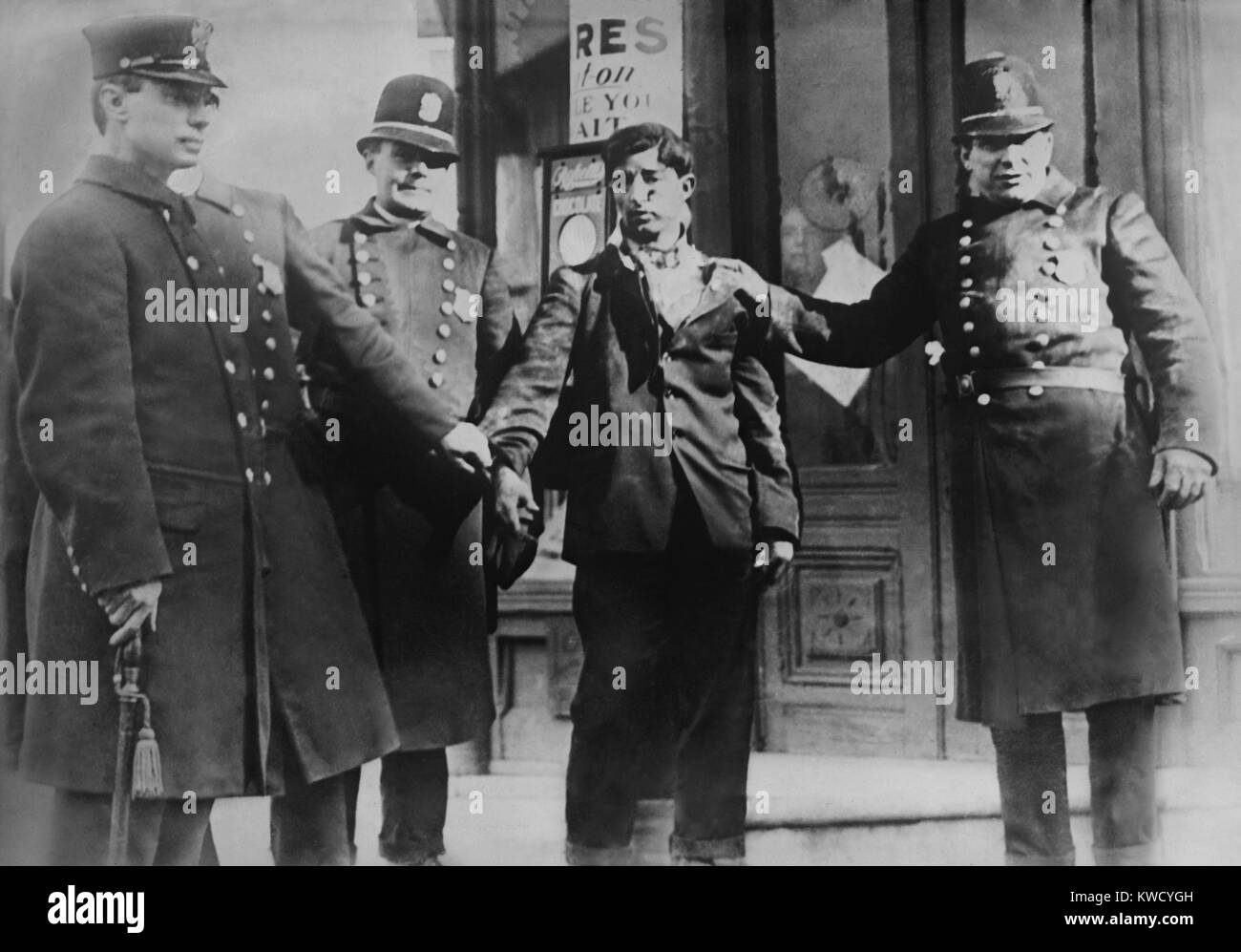 Battered striker with policemen during the Philadelphia Trolley Strike ...