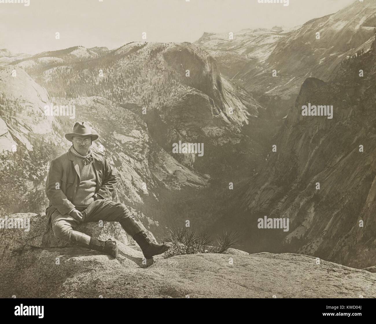 President Theodore Roosevelt sitting on large stone, Glacier Point at ...