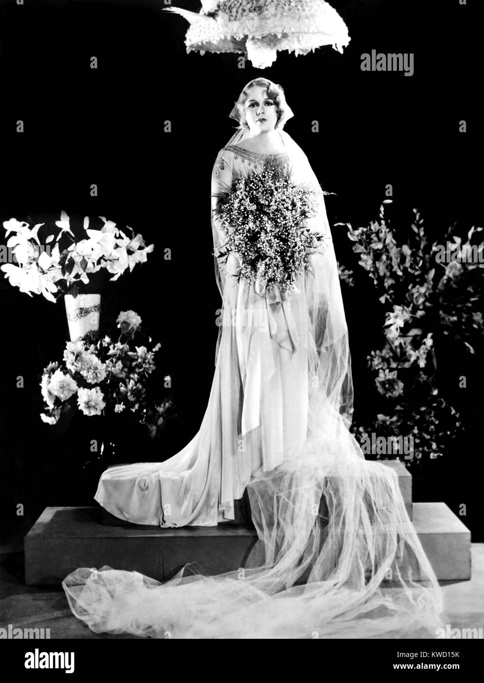 Anita Page modeling a wedding gown, 1932 Stock Photo - Alamy