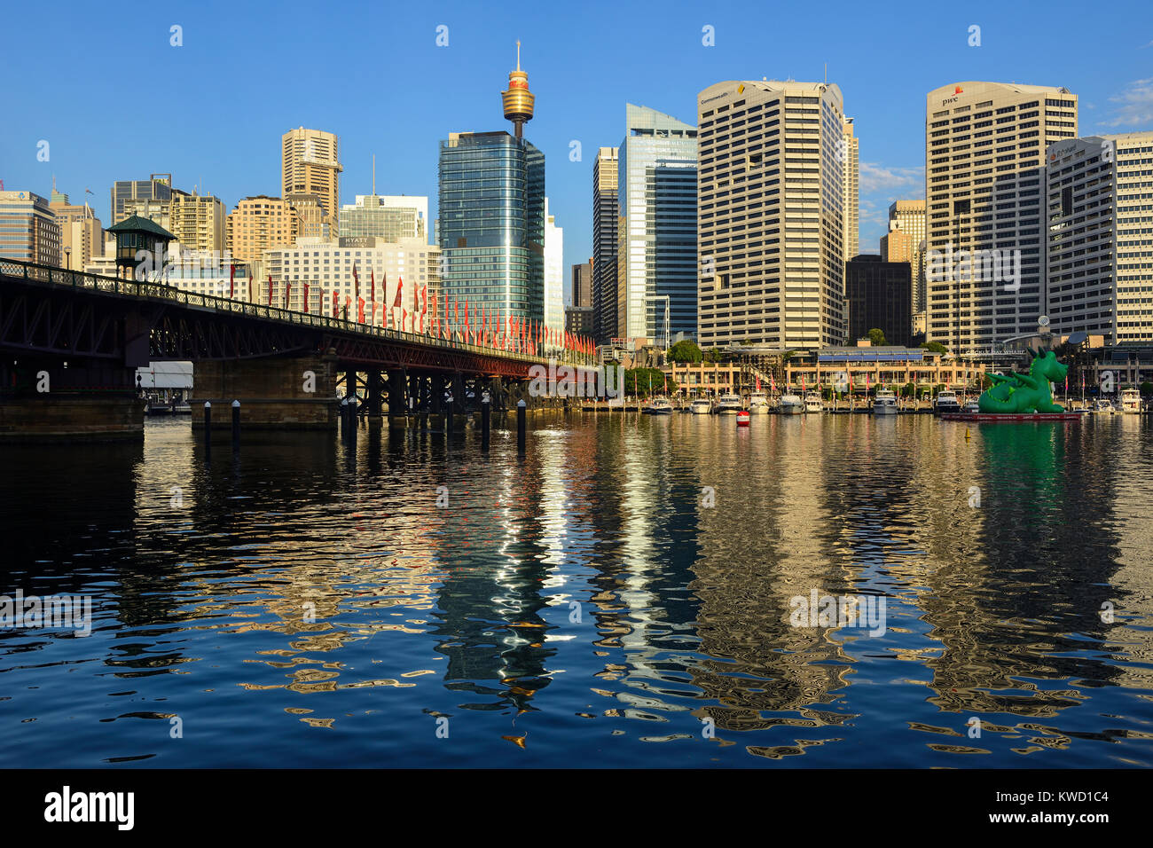 Pyrmont Bridge and Cockle Bay Wharf in Darling Harbour, with Sydney ...