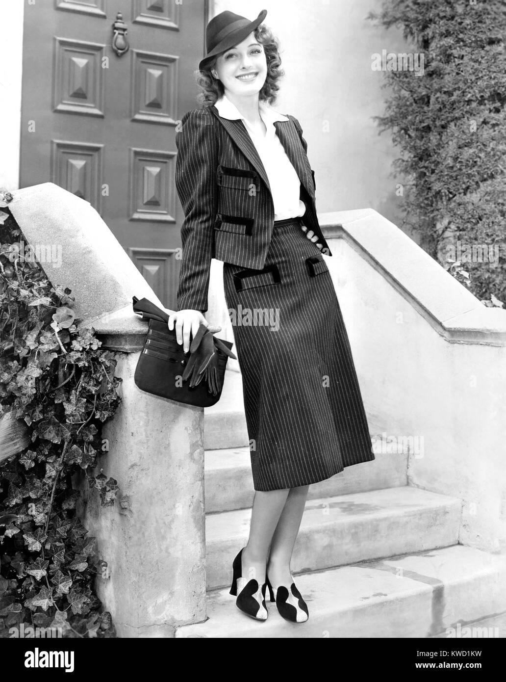 Ellen Drew in a pin-striped serge suit, 1938 Stock Photo - Alamy