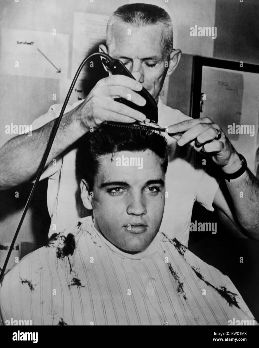 Elvis Presley getting his G.I. haircut, 1958 Stock Photo - Alamy