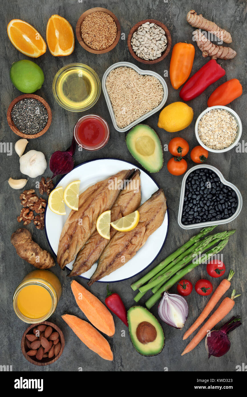 Healthy heart food concept with mackerel, vegetables, fruit, nuts ...