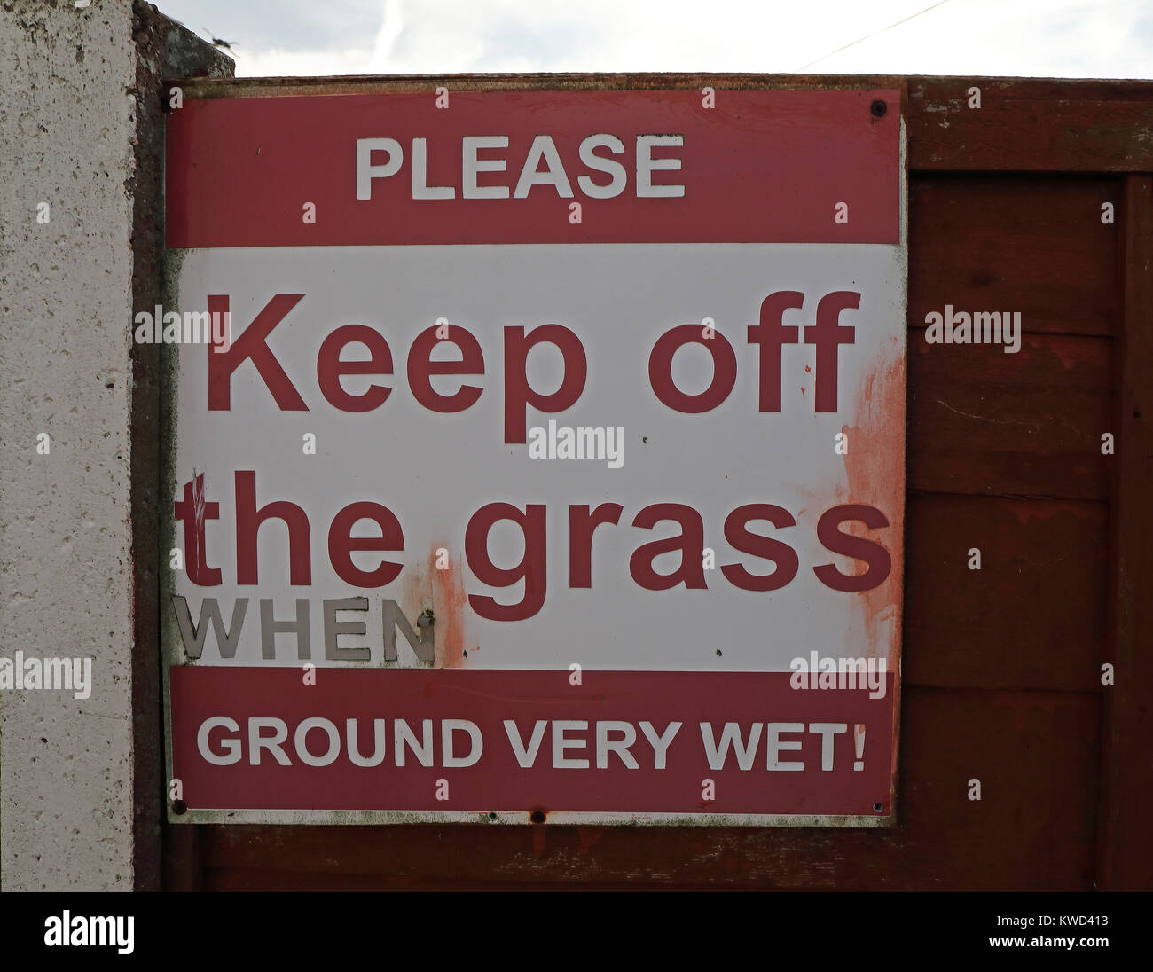 keep off the grass when wet sign Eccles-on-Sea, Norfolk, UK December ...