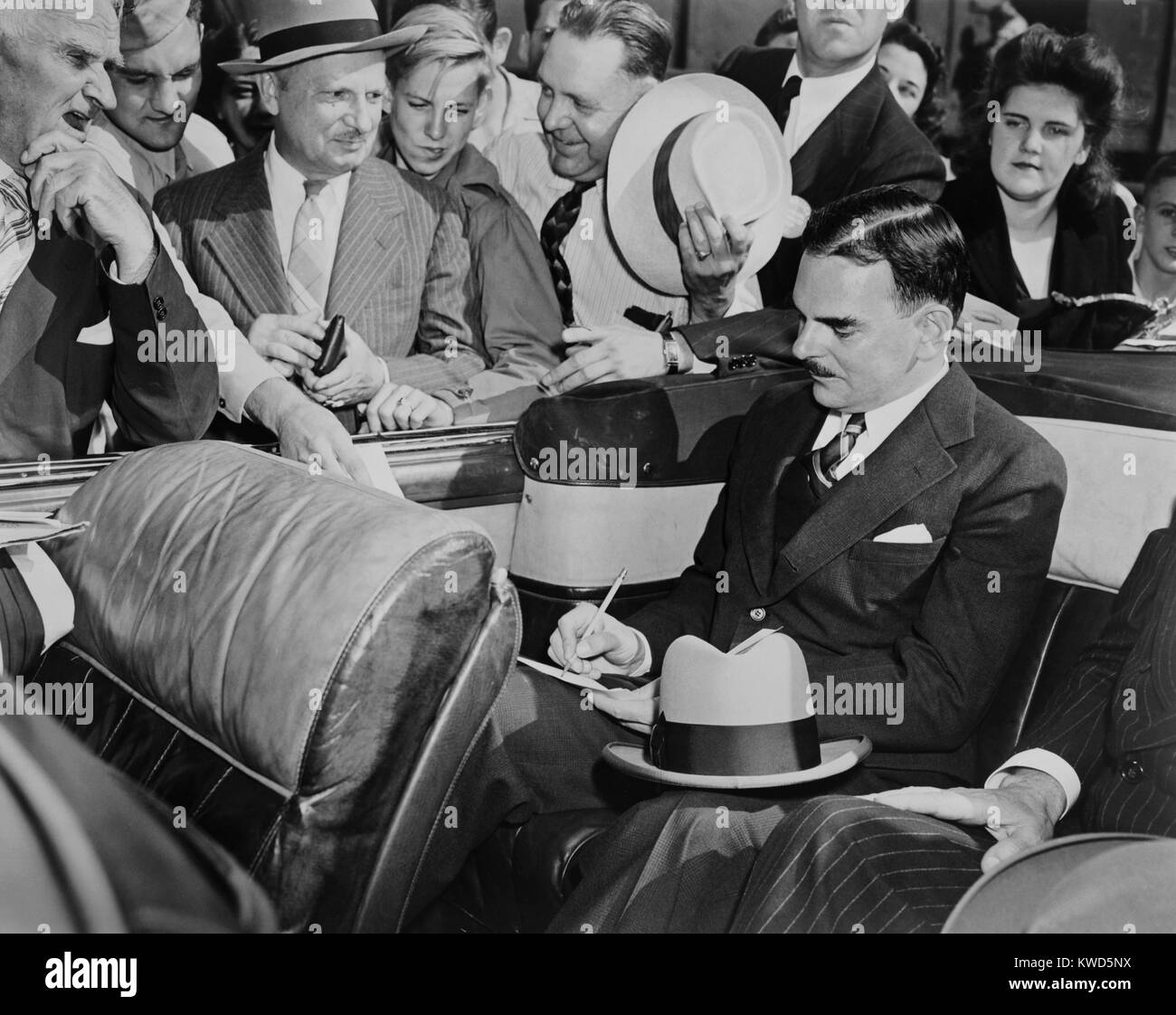 Republican Presidential candidate Thomas Dewey signing autographs in ...