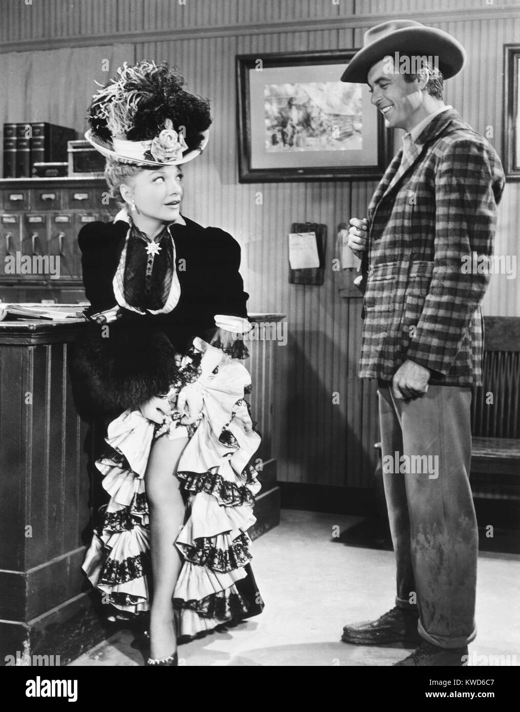 THE SPOILERS, from left: Anne Baxter, Rory Calhoun, 1955 Stock Photo ...