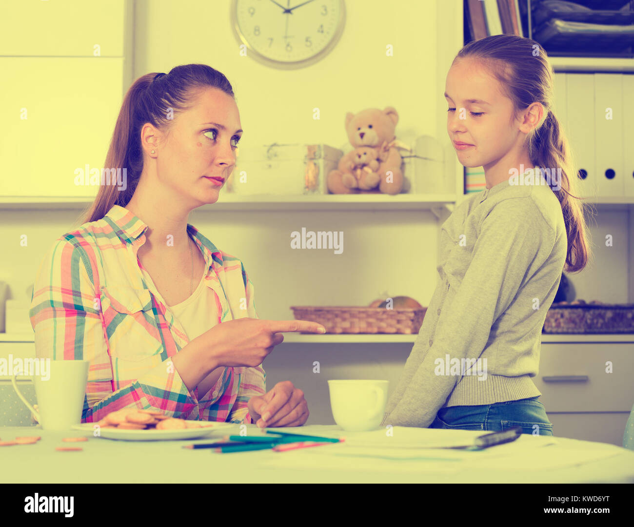 Young mother scolding her daughter for bad behavior and mistakes Stock Photo - Alamy