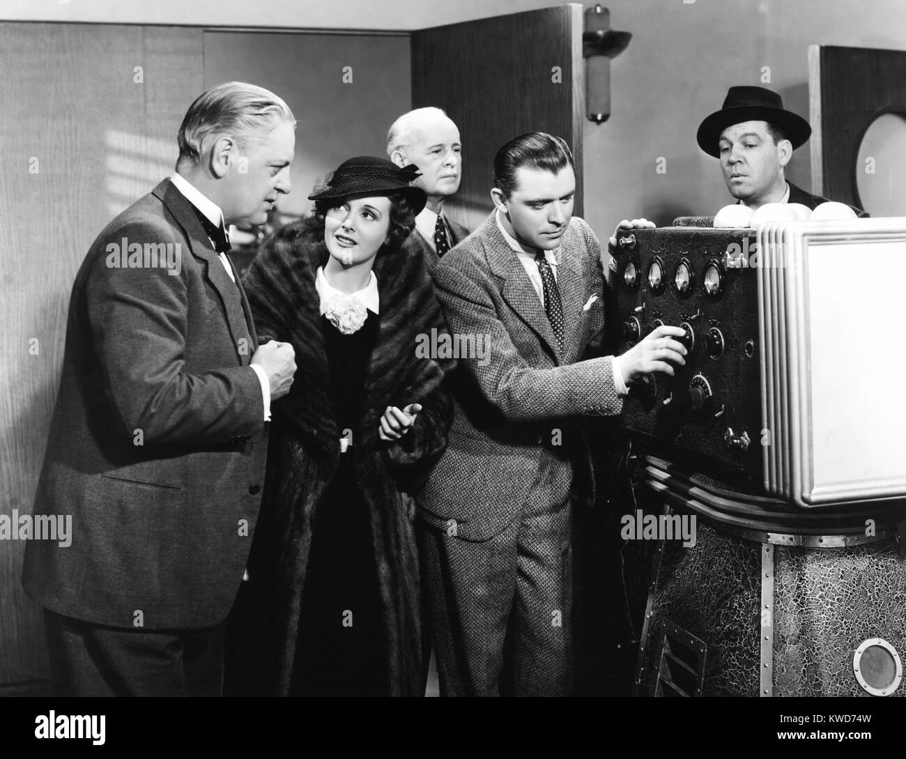 TRAPPED BY TELEVISION, from left: Thurston Hall, Mary Astor, Wyrley ...