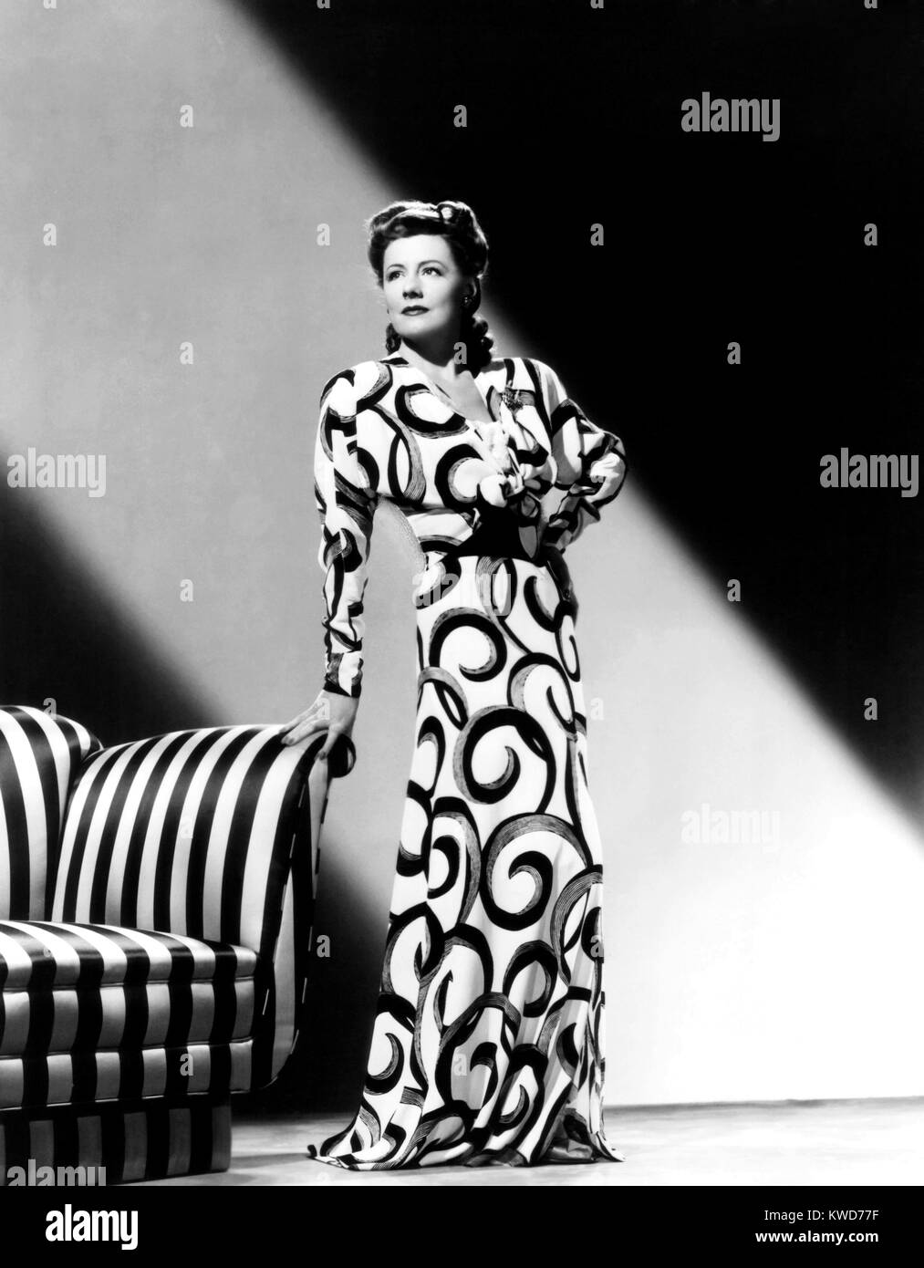 UNFINISHED BUSINESS, Irene Dunne, in a gown by Howard Greer, 1941 Stock ...