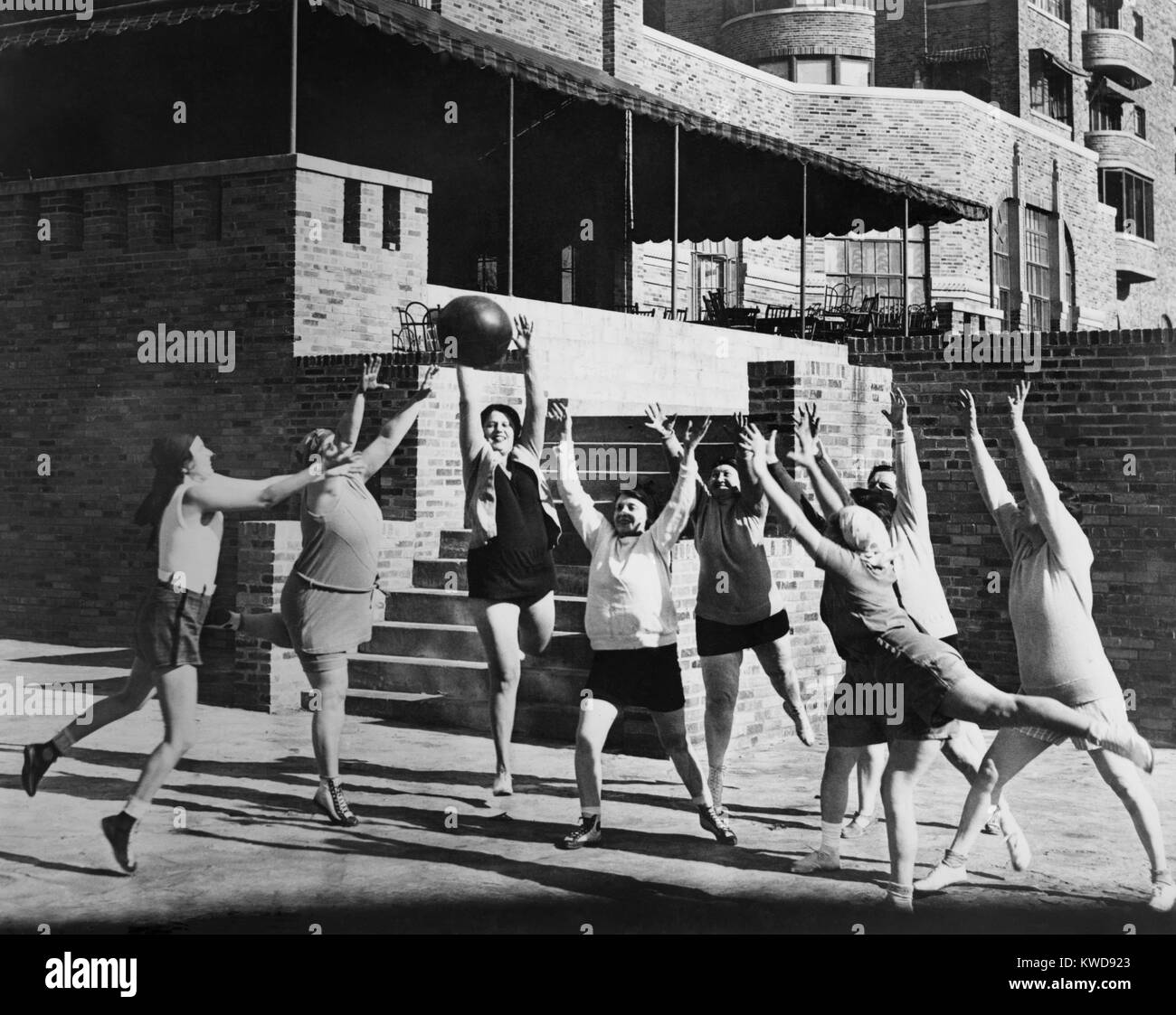 Washington society women working out with a medicine ball in Washington ...