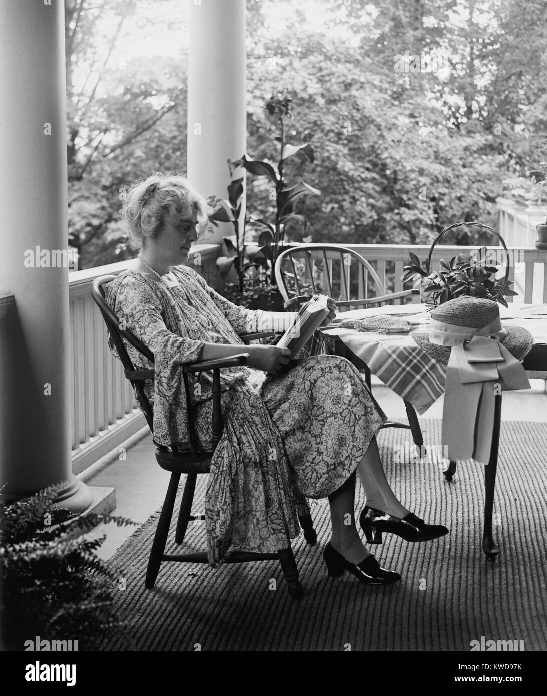 Lou Henry Hoover, future First Lady, reading on her porch in 1926. She ...