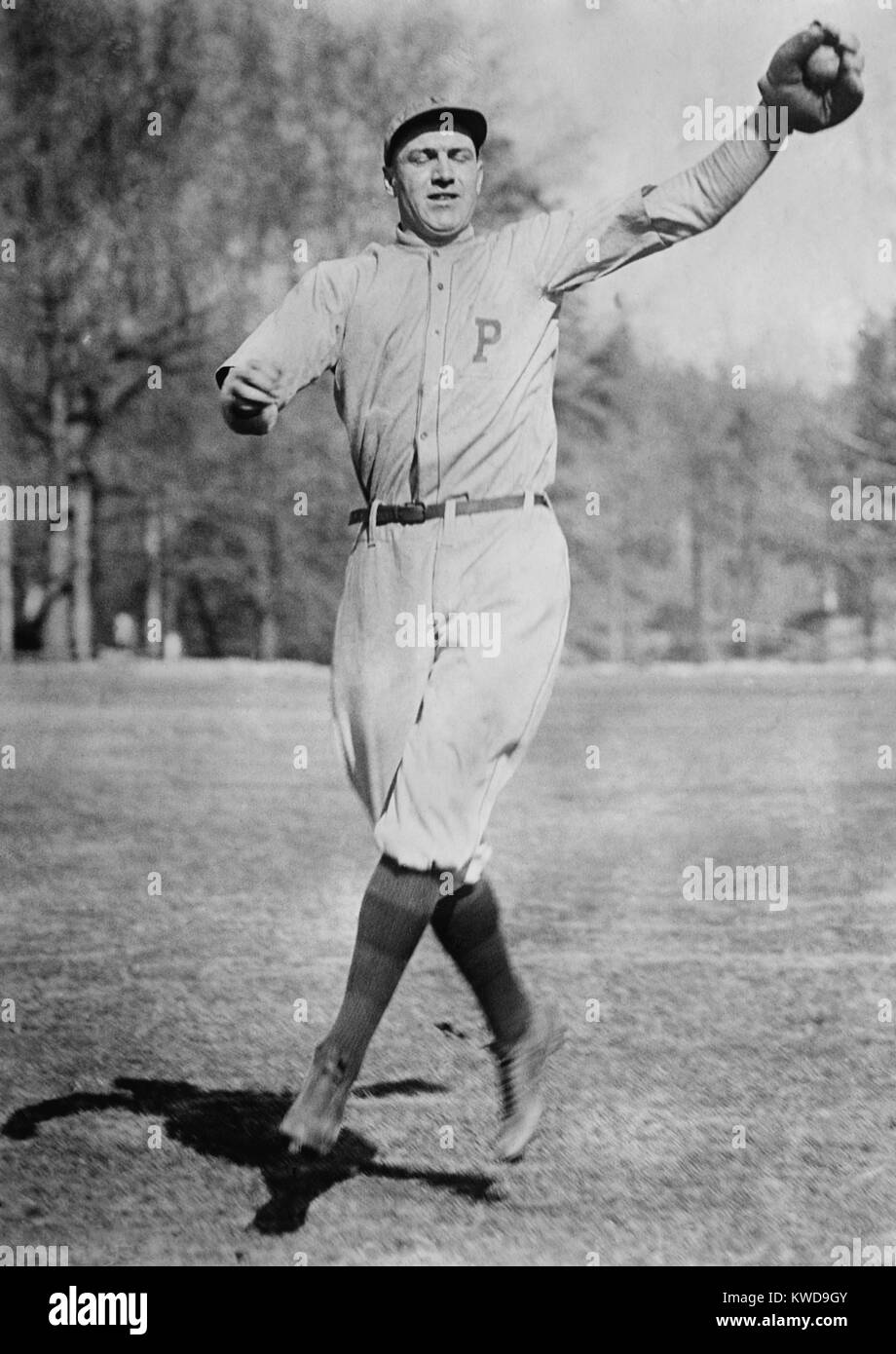 Pittsburgh Pirate third baseman Harold 'Pie' Traynor making a jumping ...