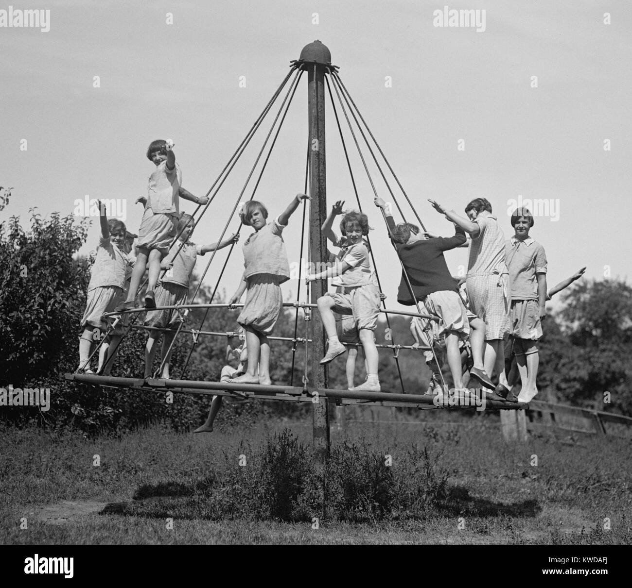 Females on merry go round hi-res stock photography and images - Alamy