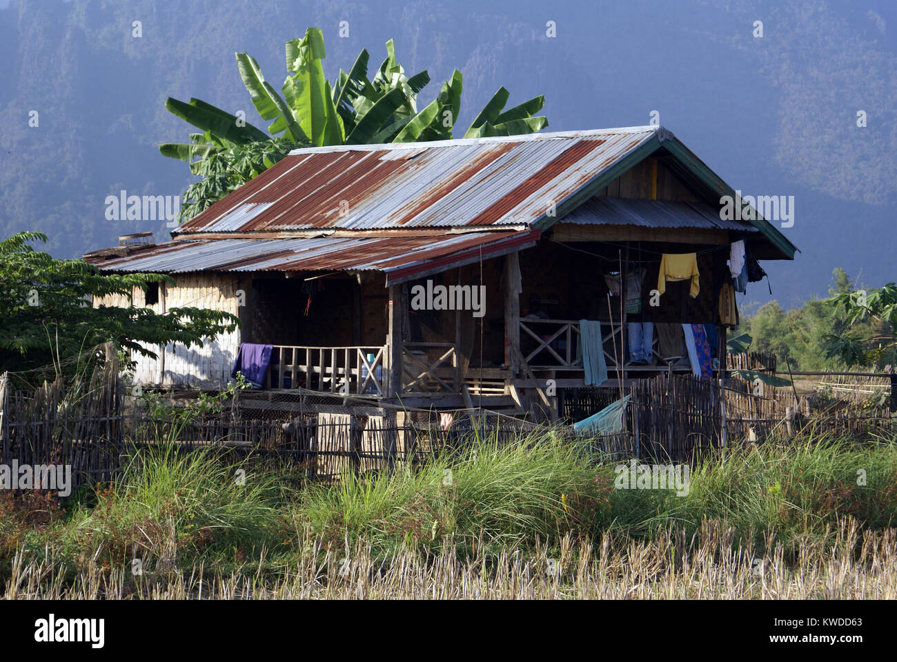 Small rusty house in village, North Laos Stock Photo - Alamy