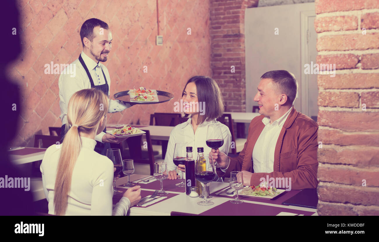 Young waiter placing order hi-res stock photography and images - Alamy