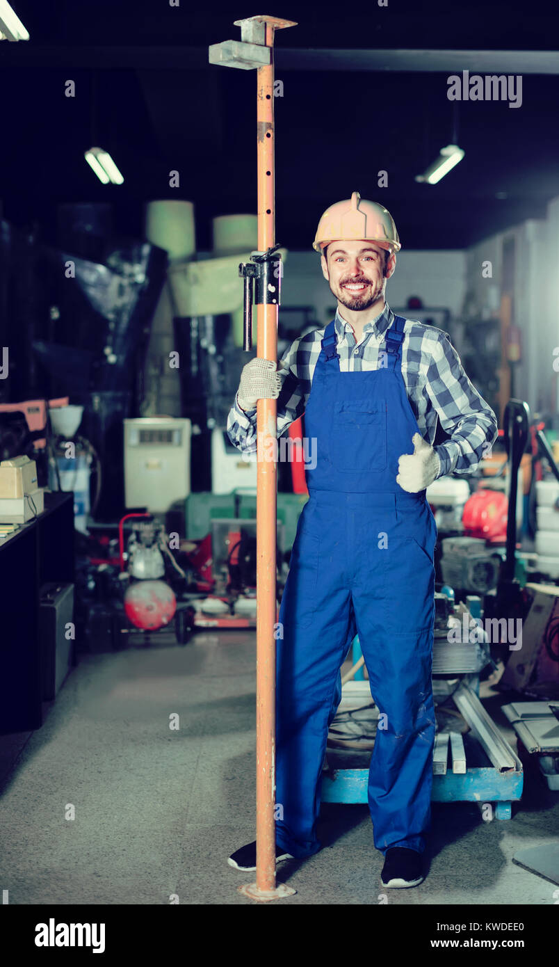 happy european working man practicing his skills erect trestle at ...