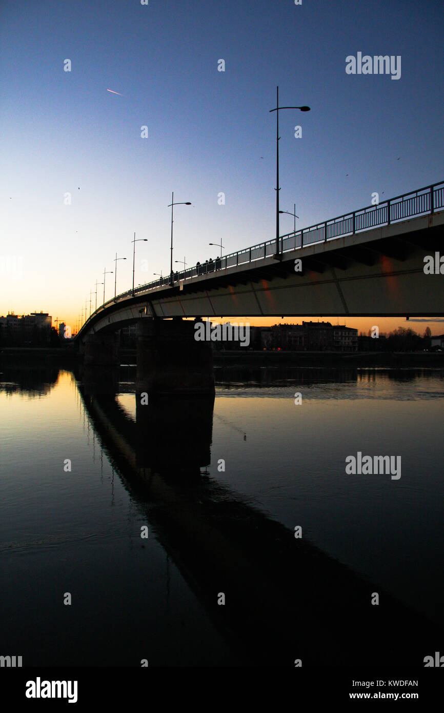bridge , reflection of bridge in water in sunset, city Stock Photo - Alamy