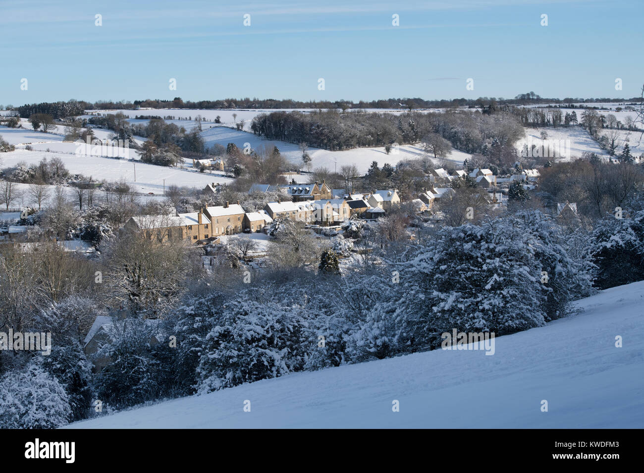 Naunton village in the snow in December. Naunton, Cotswolds ...