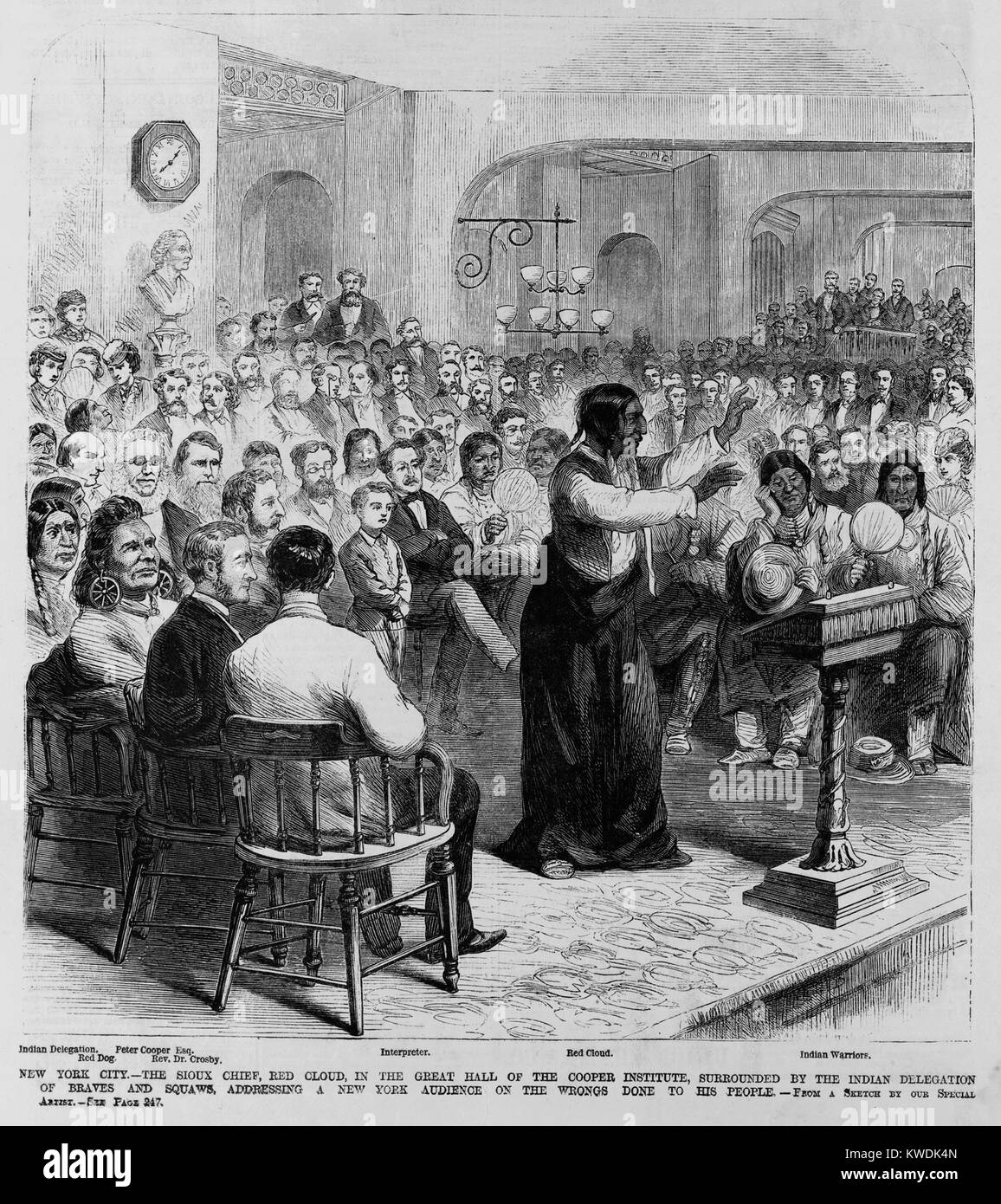 Speaking surrounded Black and White Stock Photos & Images - Alamy