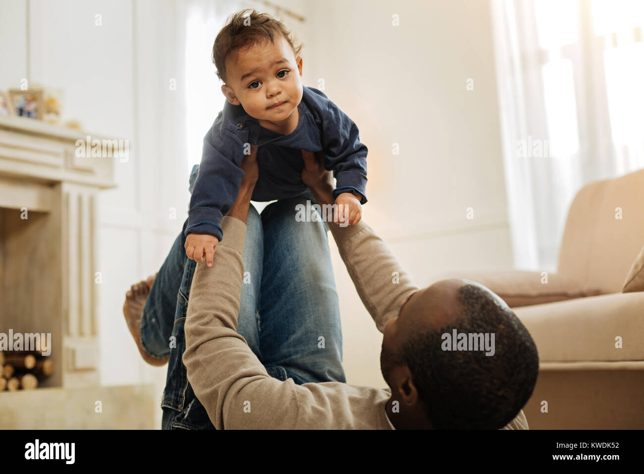 Happy daddy spending time with his son Stock Photo - Alamy