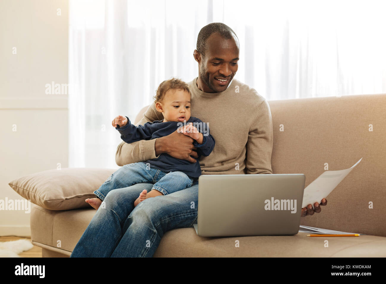 Happy father on a paternal leave Stock Photo - Alamy