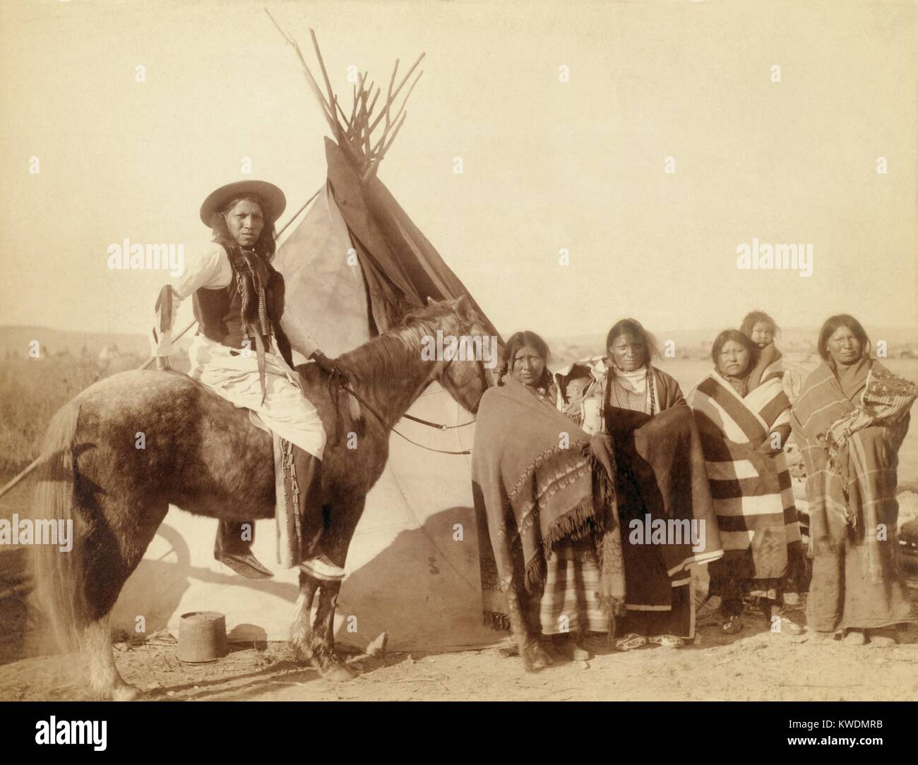 Lakota women, three with babies infants in cradleboards, and a Lakota ...