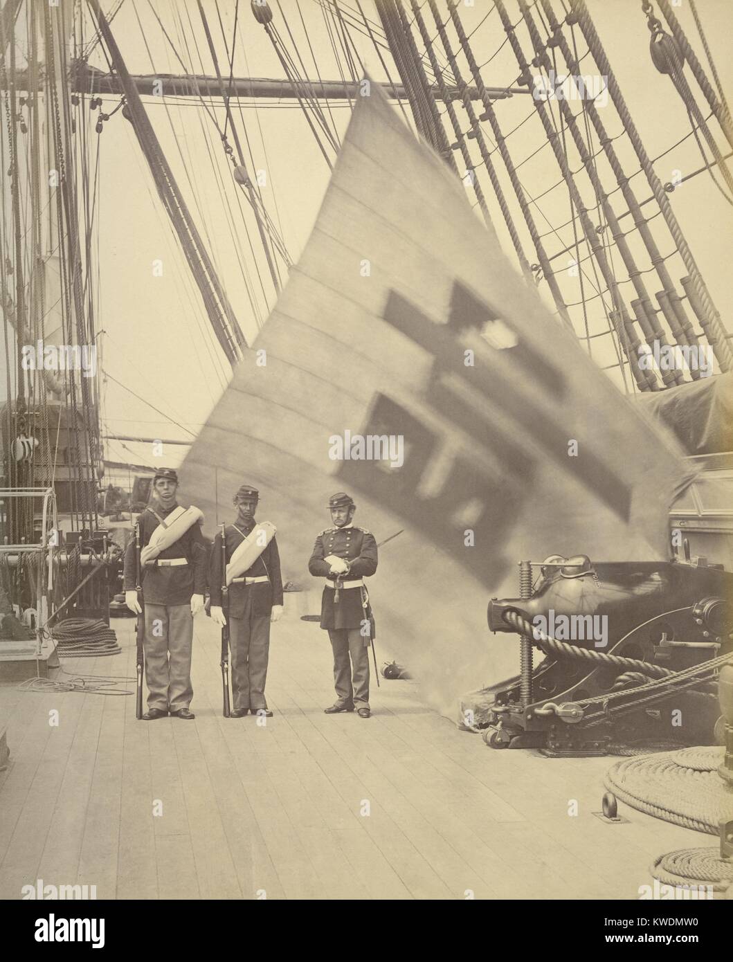 US sailors display the captured Flag of Eo Jae-yeon, the commander of ...