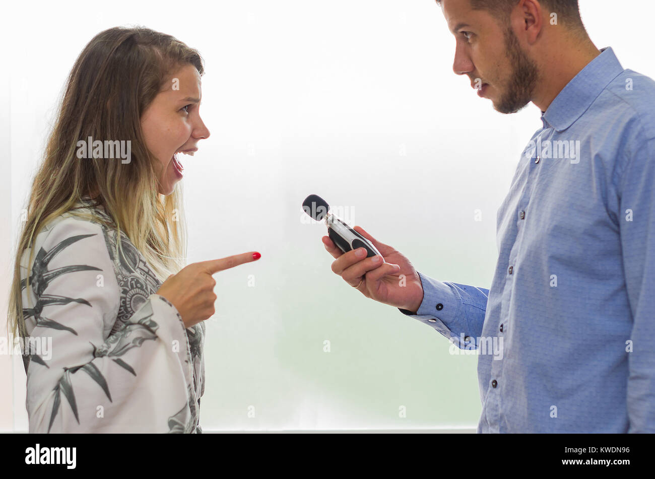 Great concept of screaming, woman screaming and man measuring the ...