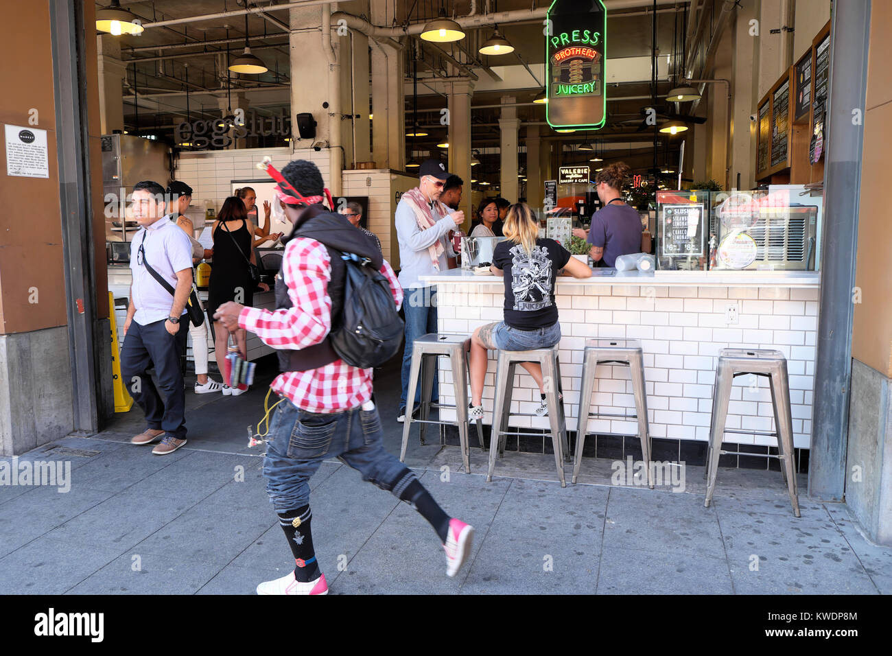 Man walking on the street market hi-res stock photography and images ...