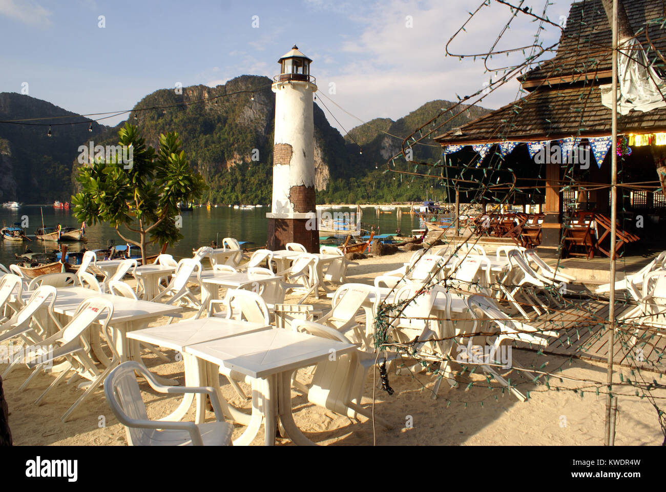 Tables and lighthouse in restaurant Stock Photo - Alamy