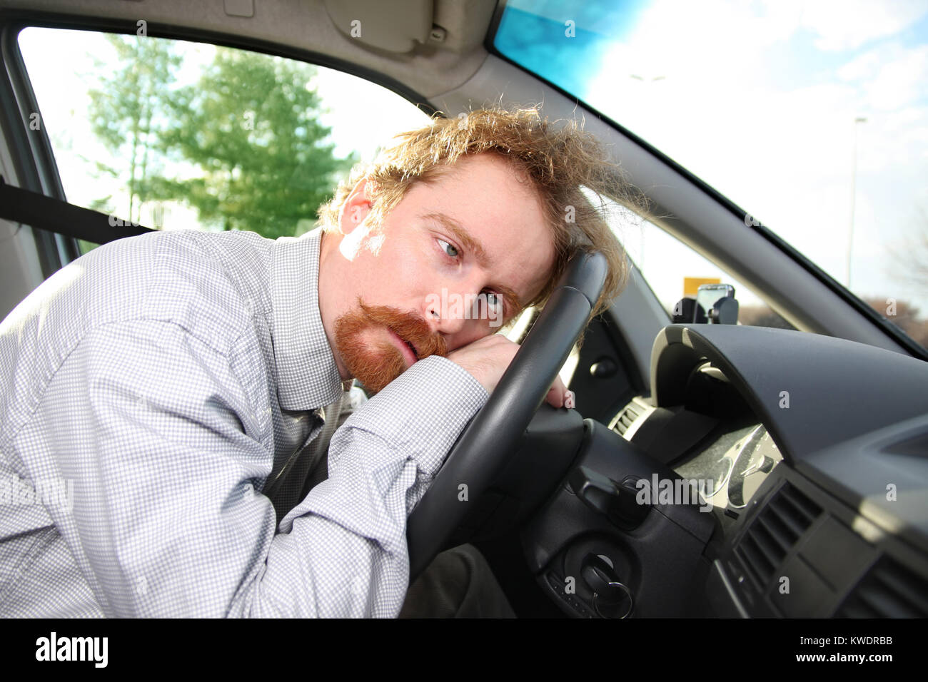 tired driver sleeps in a car Stock Photo - Alamy