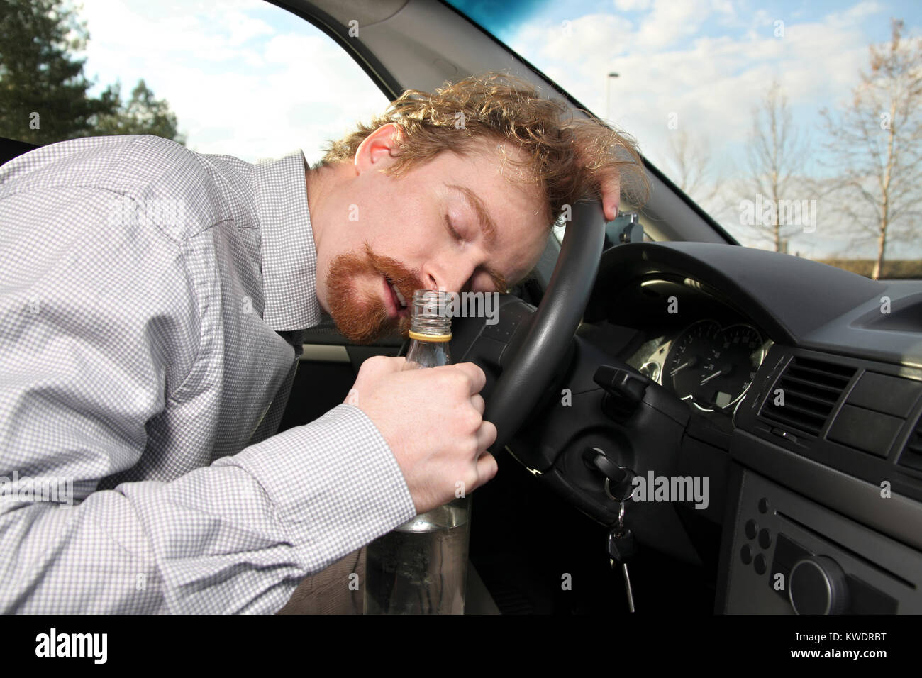 tired driver sleeps in a car Stock Photo - Alamy